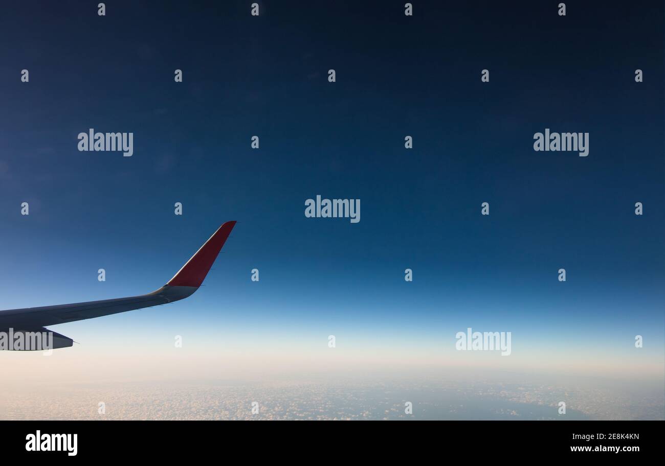 Travel view window plane with mountains and clouds at background Stock ...