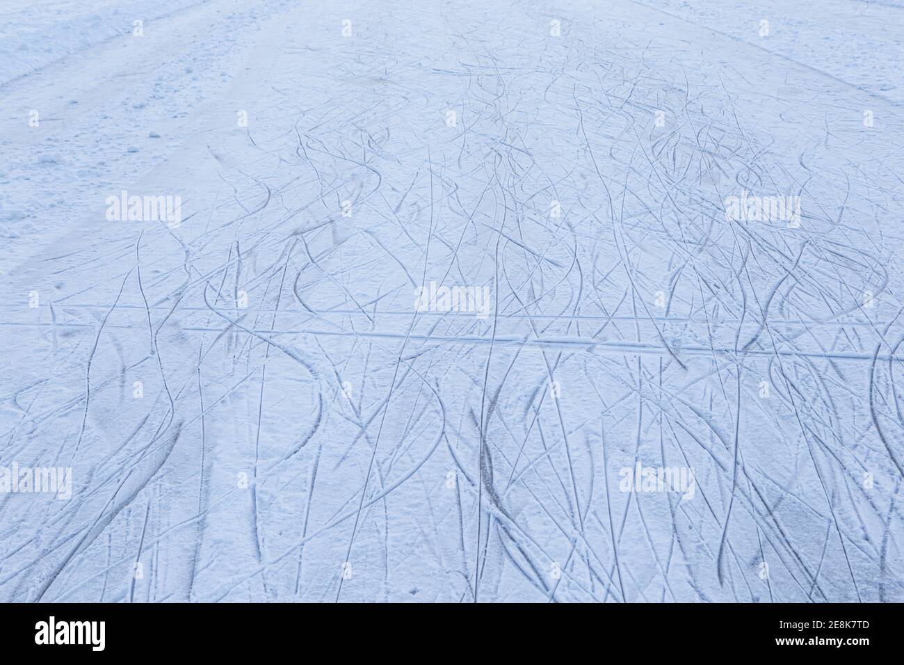 Empty ice skating track at the frozen lake Stock Photo - Alamy
