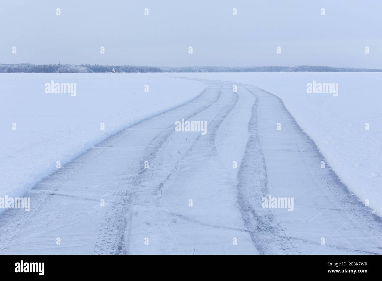 Empty ice skating track at the frozen lake Stock Photo - Alamy