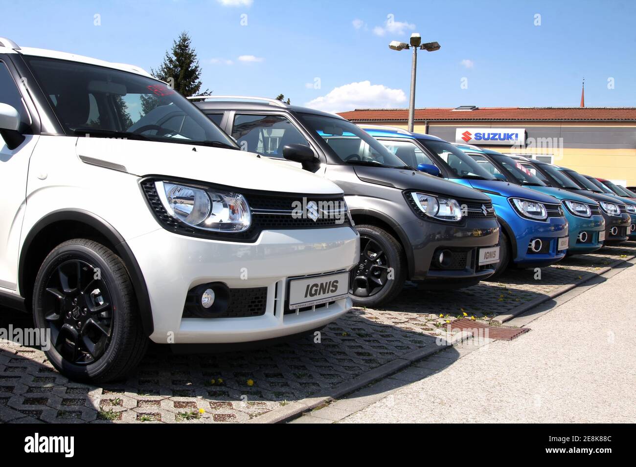 SUZUKI logo, dealer in Ansbach, Germany. Suzuki Motor Corporation is a ...