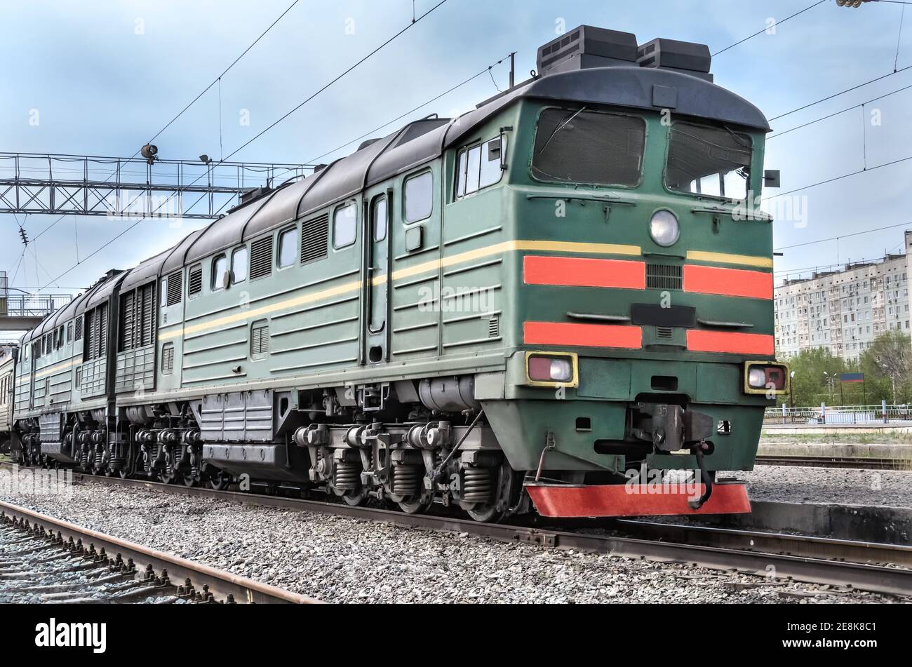 Diesel locomotive on a background of clouds (all logos, inscriptions ...