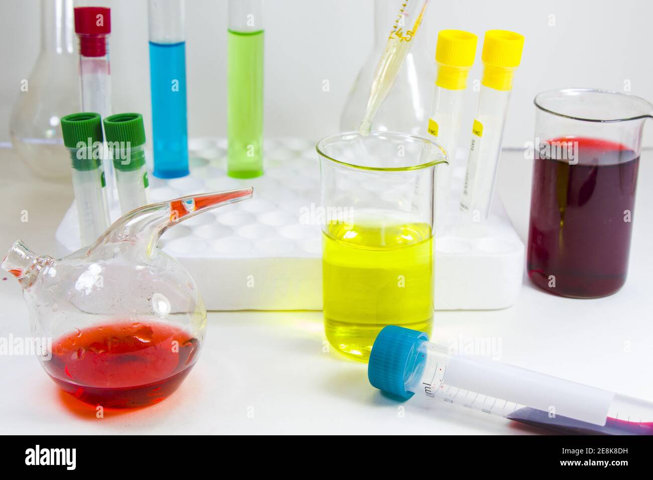 An isolated shot of different flasks with colorful liquid and a blood ...