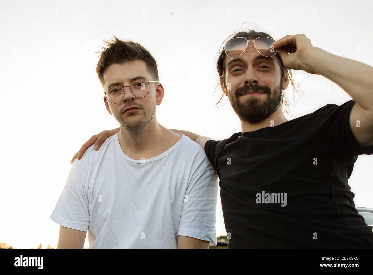 European young white men in t-shirts on white Stock Photo - Alamy