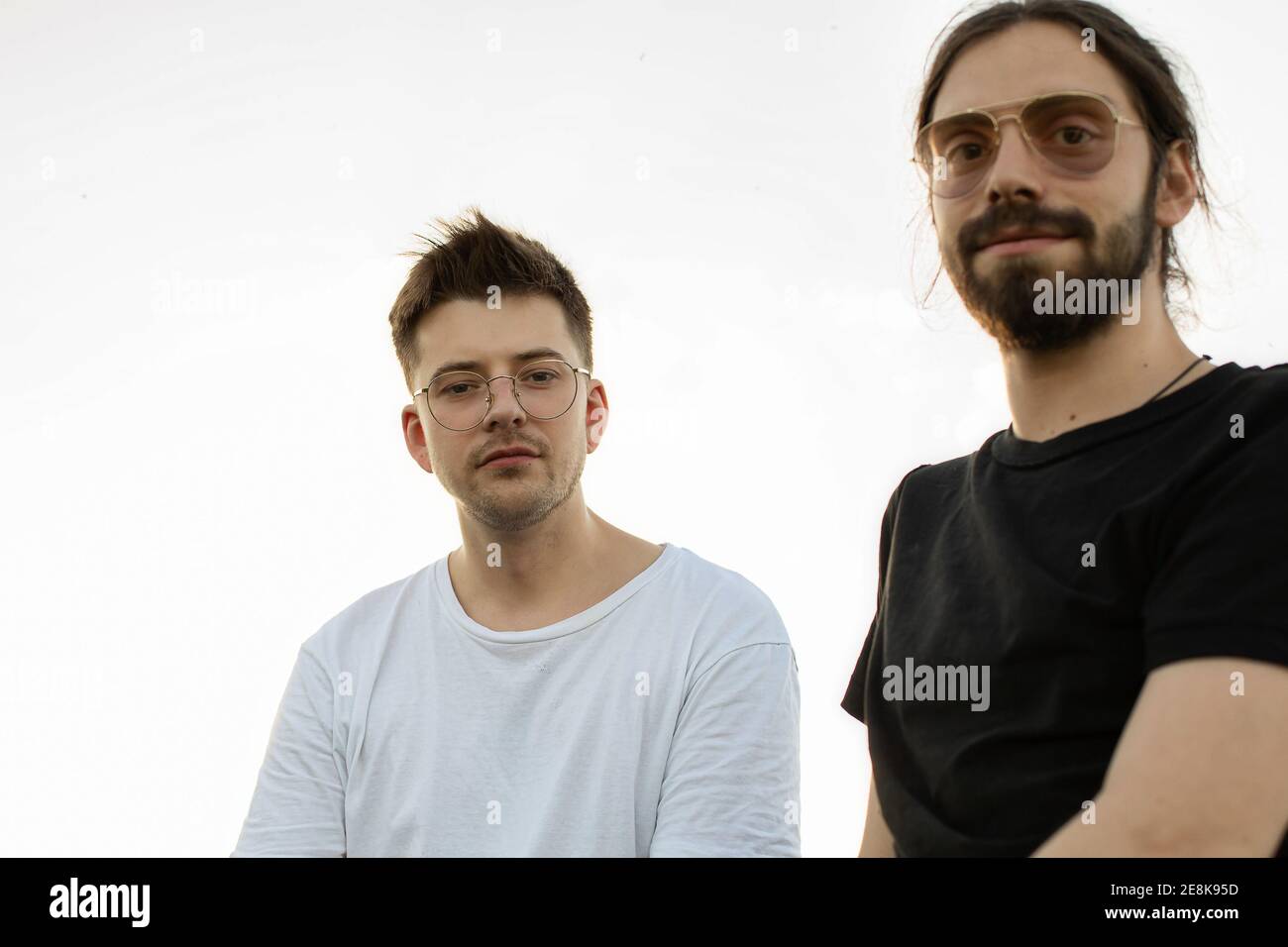 European young white men in sunglasses portrait on white Stock Photo ...