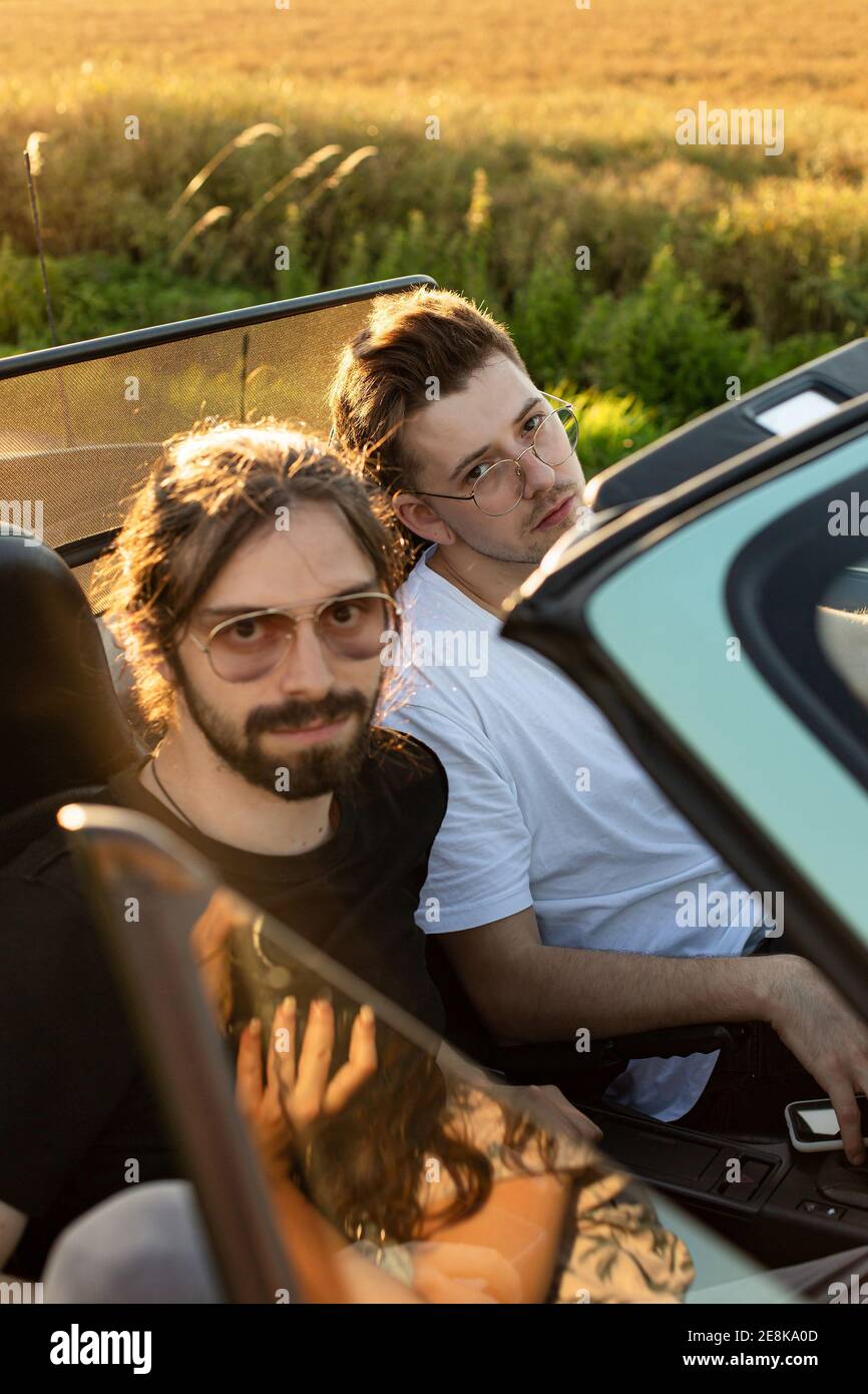 Young white models men in the car Stock Photo - Alamy