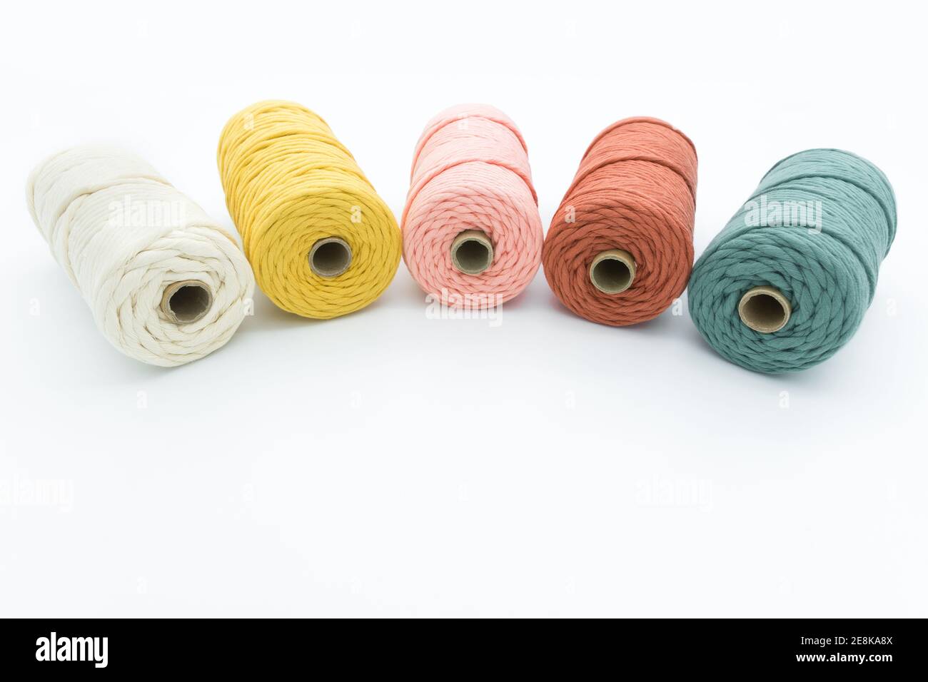 Close-up view of the colorful single strand cotton cords for macrame ...