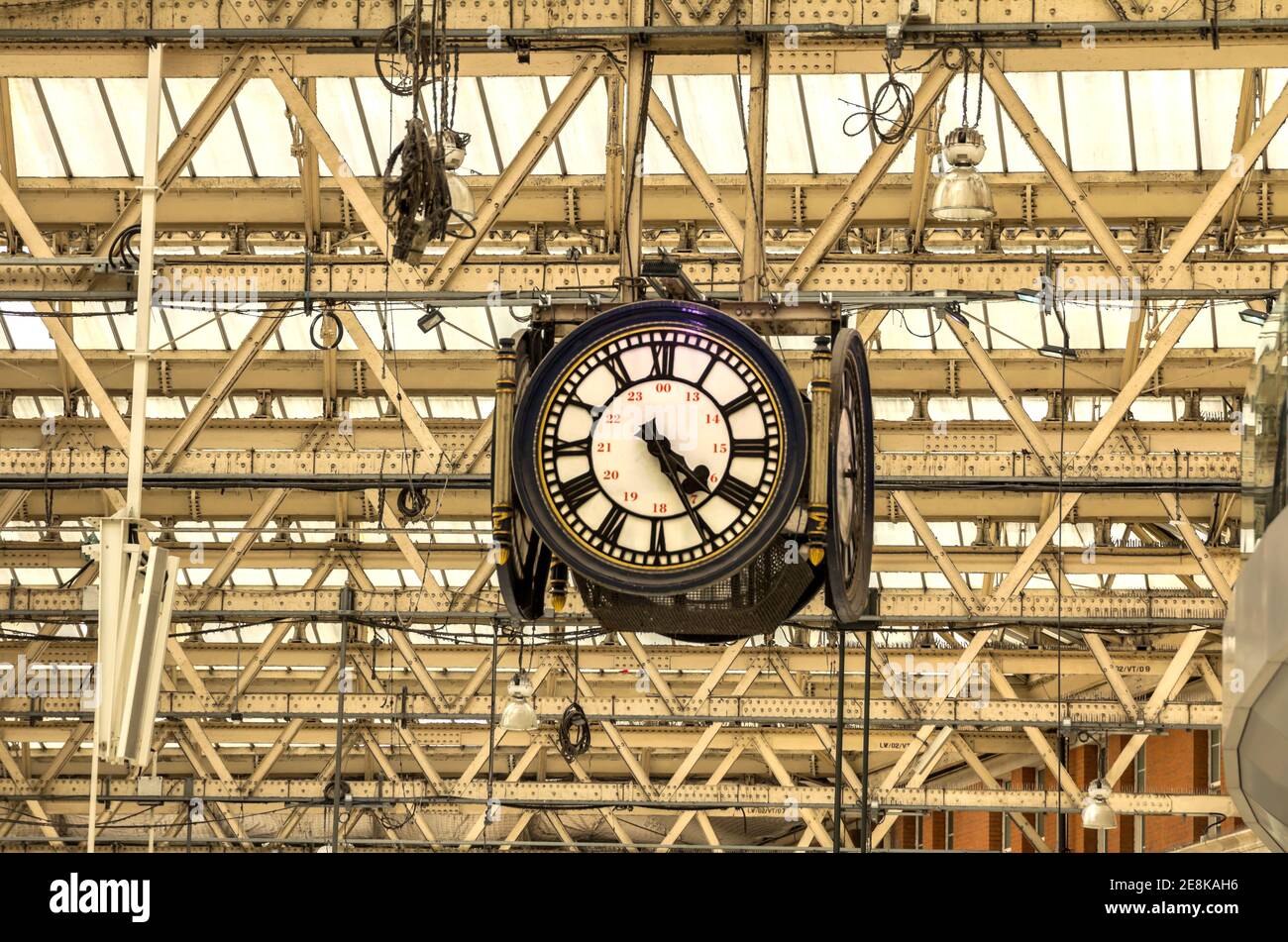 London, England : Large decorative clock hanging from a train station ...