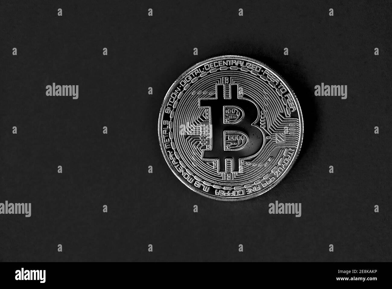 Bitcoin physical coin cutout on black background with negative space ...