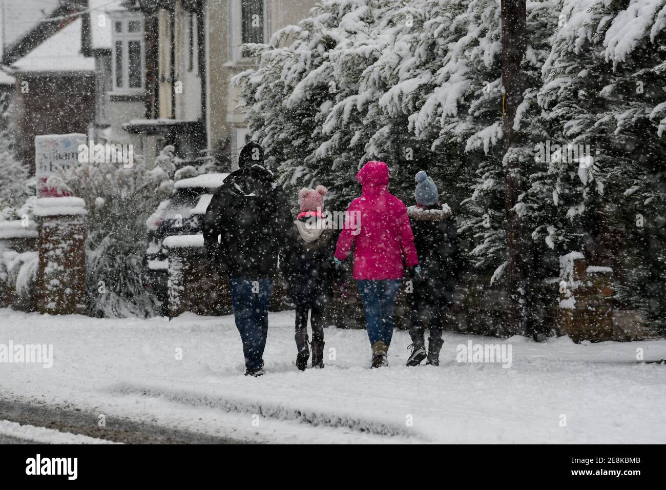 people walking in the snow Stock Photo - Alamy