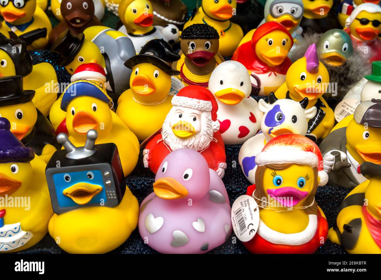 Collection of various rubber ducks in a shop window of a souvenir store ...