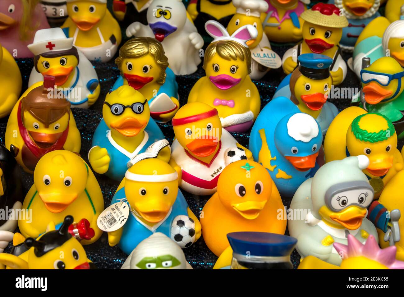 Collection of various rubber ducks in a shop window of a souvenir store ...