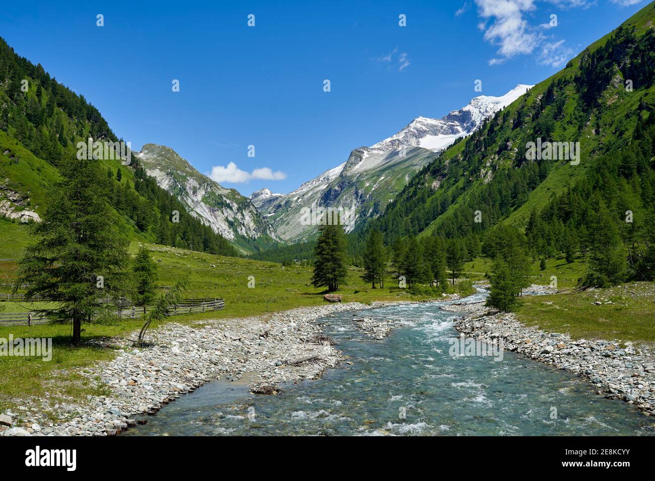 Valley in the alps with river Stock Photo - Alamy