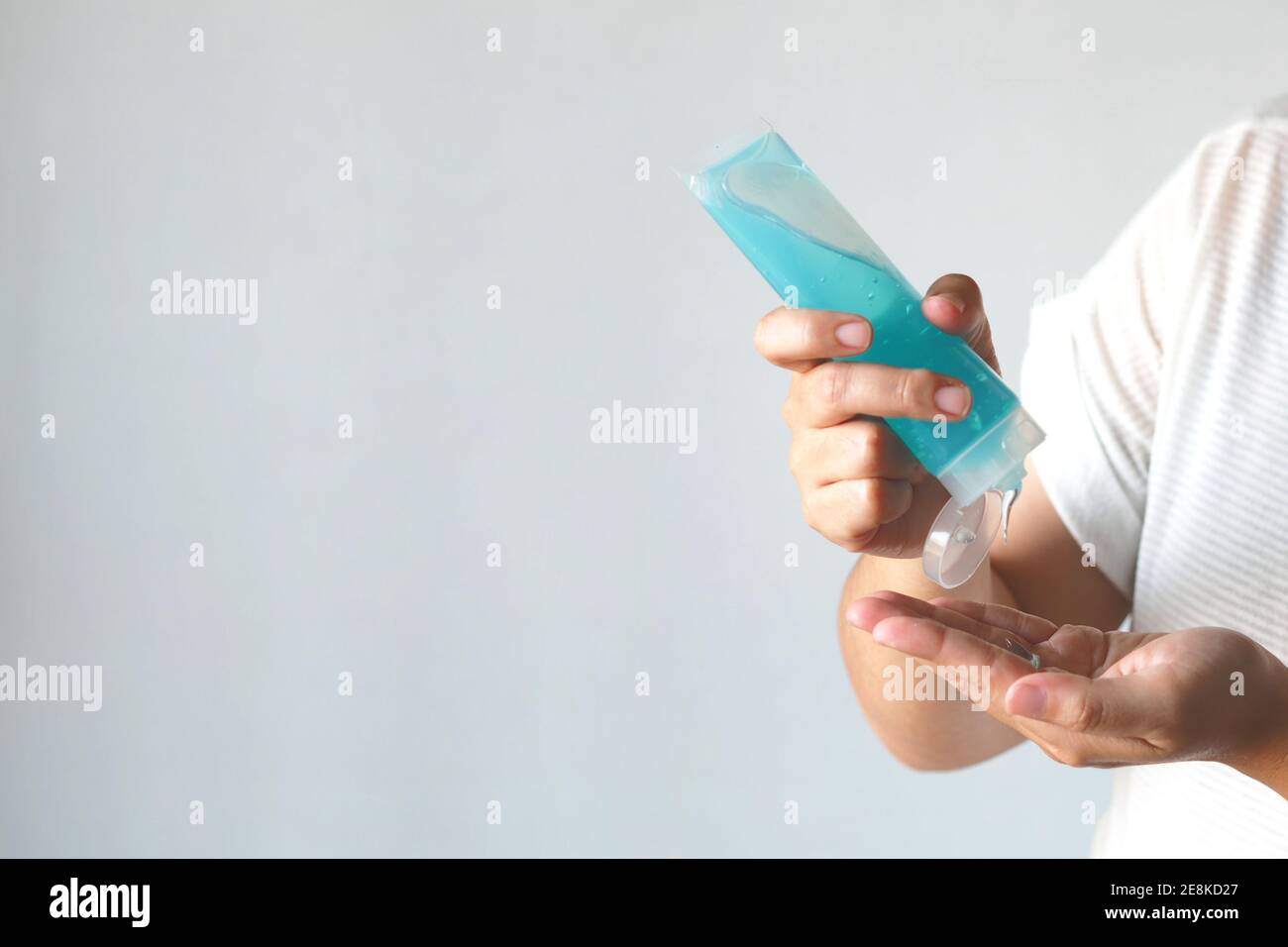 Women washing hands with alcohol gel or antibacterial soap sanitizer ...