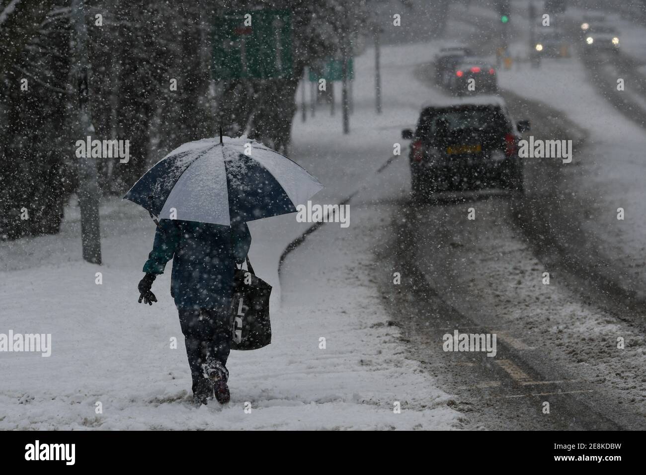 Person walking in snow hi-res stock photography and images - Alamy