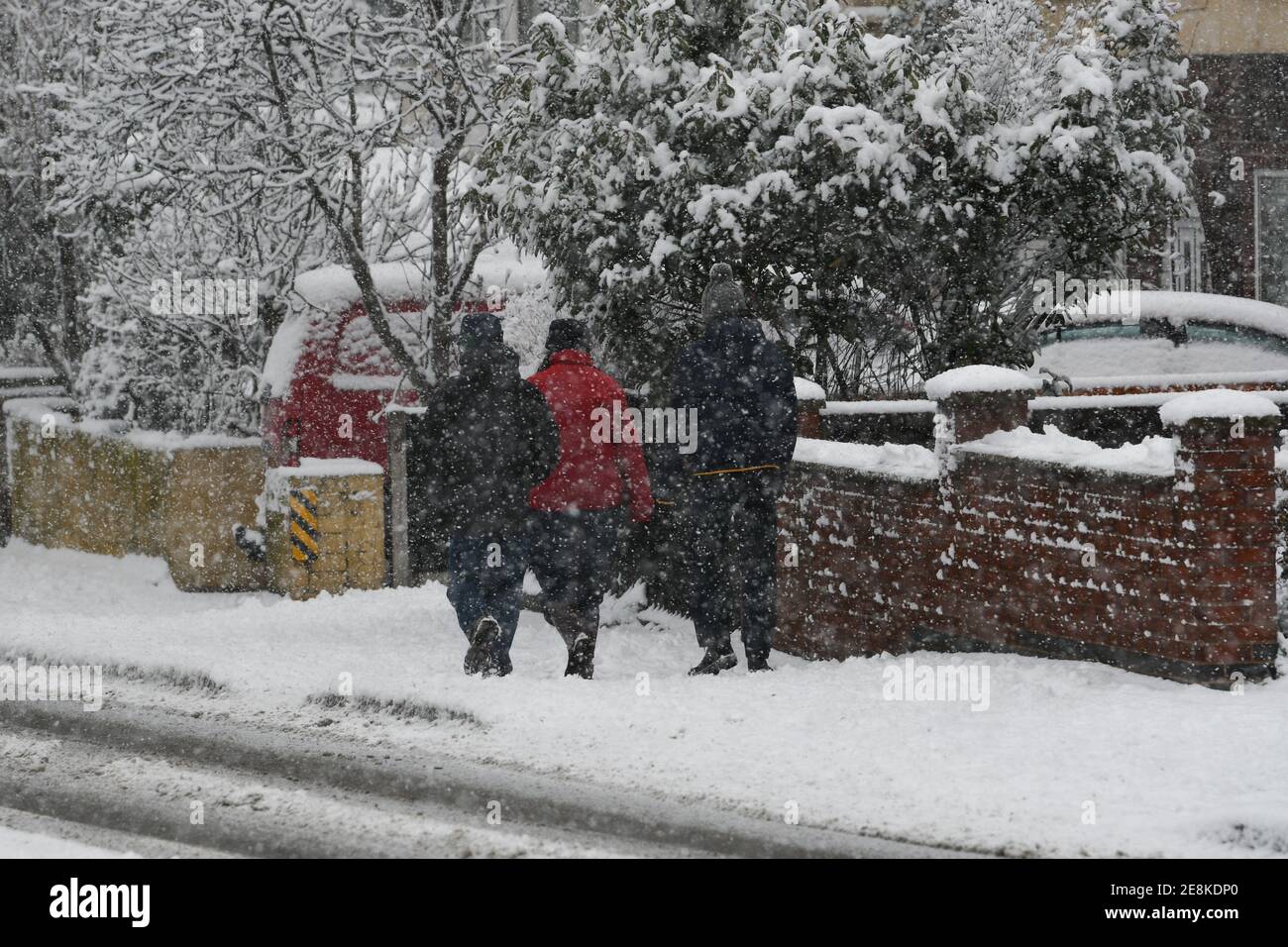 people walking in the snow Stock Photo - Alamy