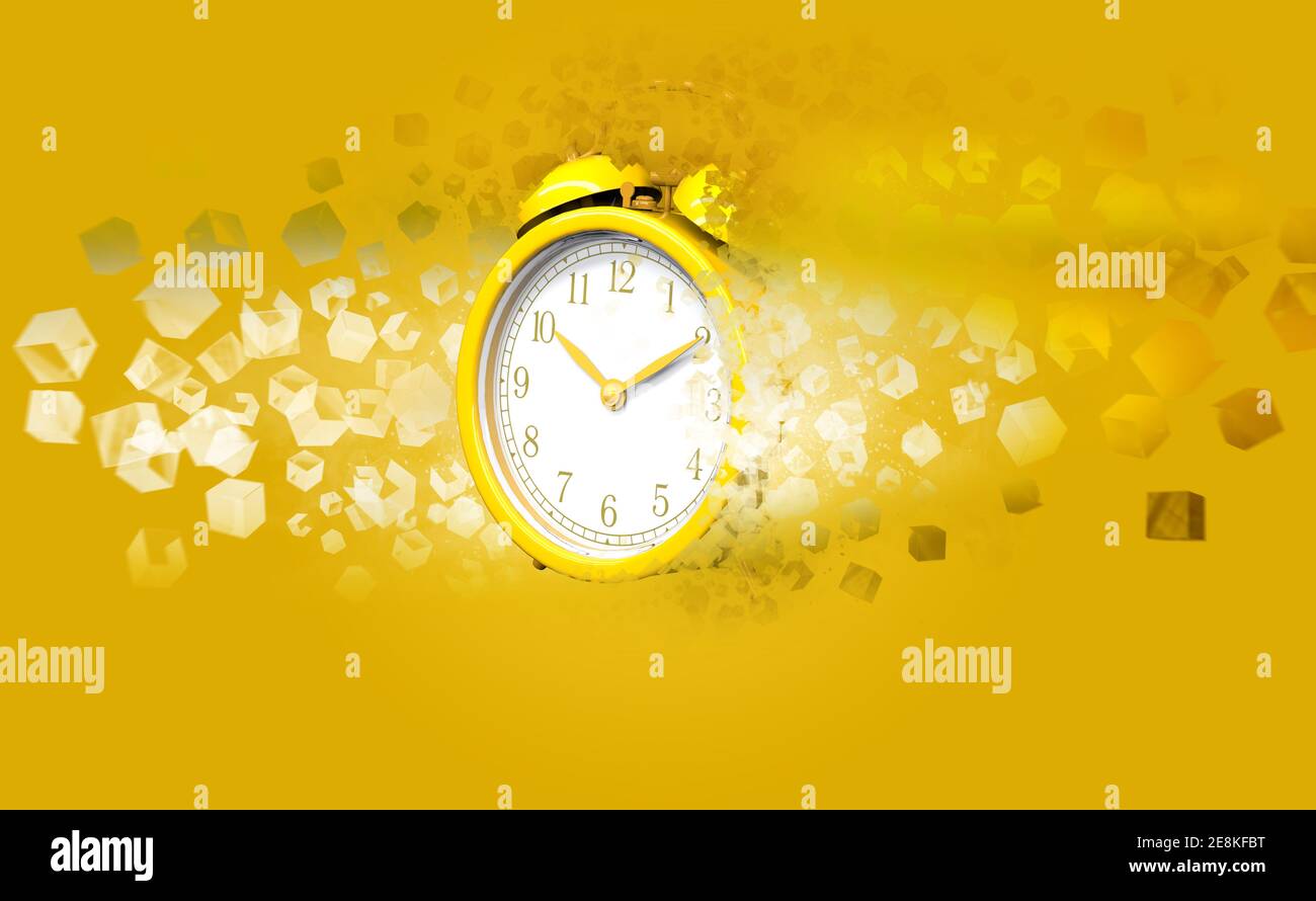 A yellow alarm clock isolated on yellow background - dispersion photo ...
