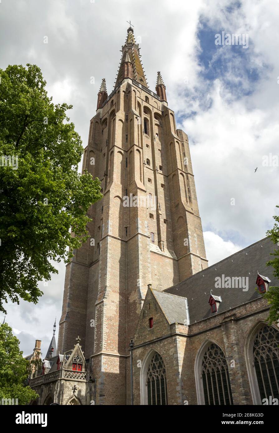 facade and tall tower of the Church of Our Lady, Bruges, Belgium Stock ...