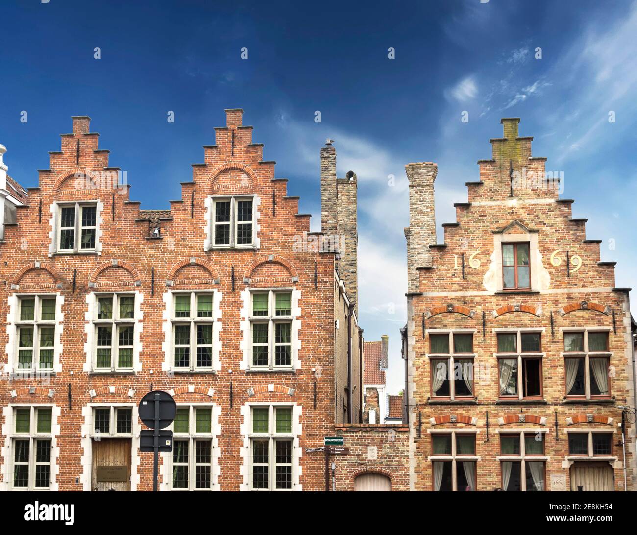 Famous old colorful buildings at Market square in Bruges, Belgium ...