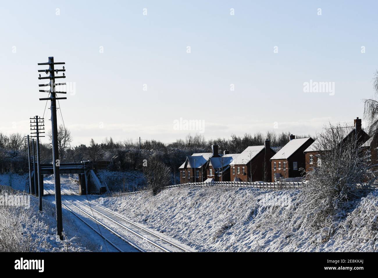 new houses built next to a railway line Stock Photo - Alamy