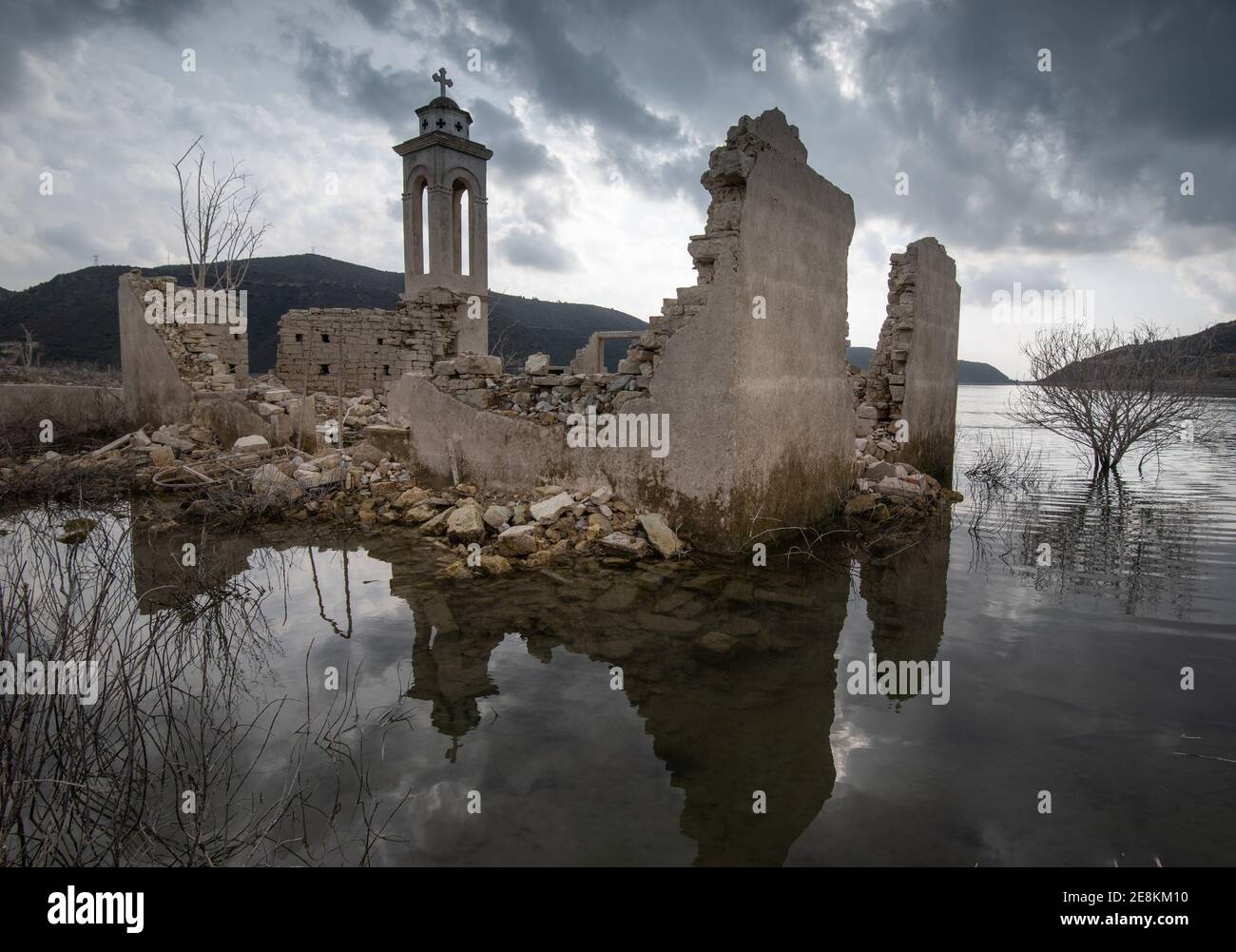 Ruins of an abandoned and deserted church in the water of a dam Stock ...