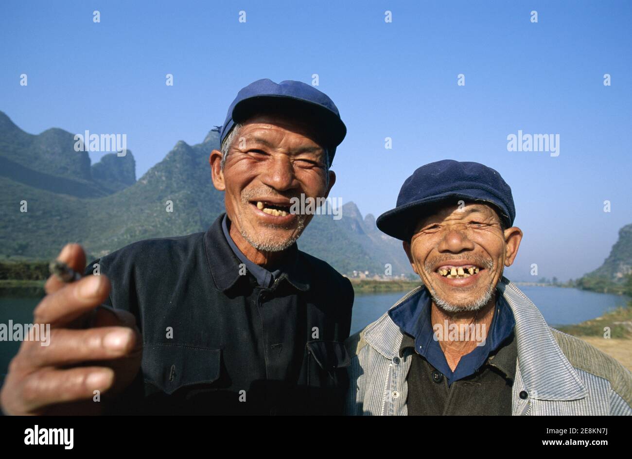 Asia,China,Guangxi,Guilin, Yangshou,portrait of Two smiling elderly ...