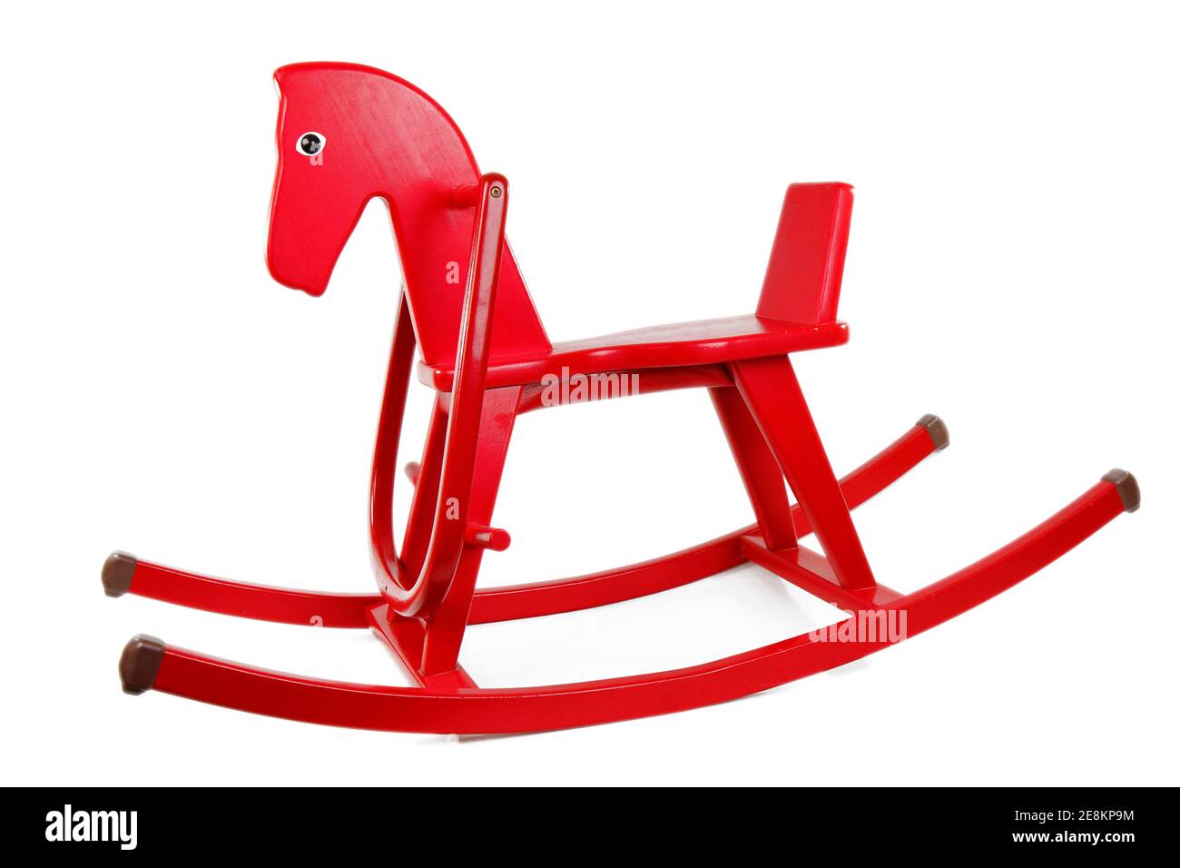 A red rocking horse isolated on white Stock Photo - Alamy