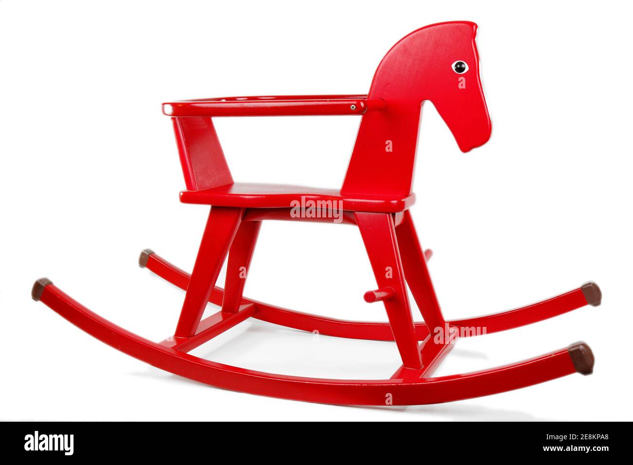 A red rocking horse isolated on white Stock Photo - Alamy