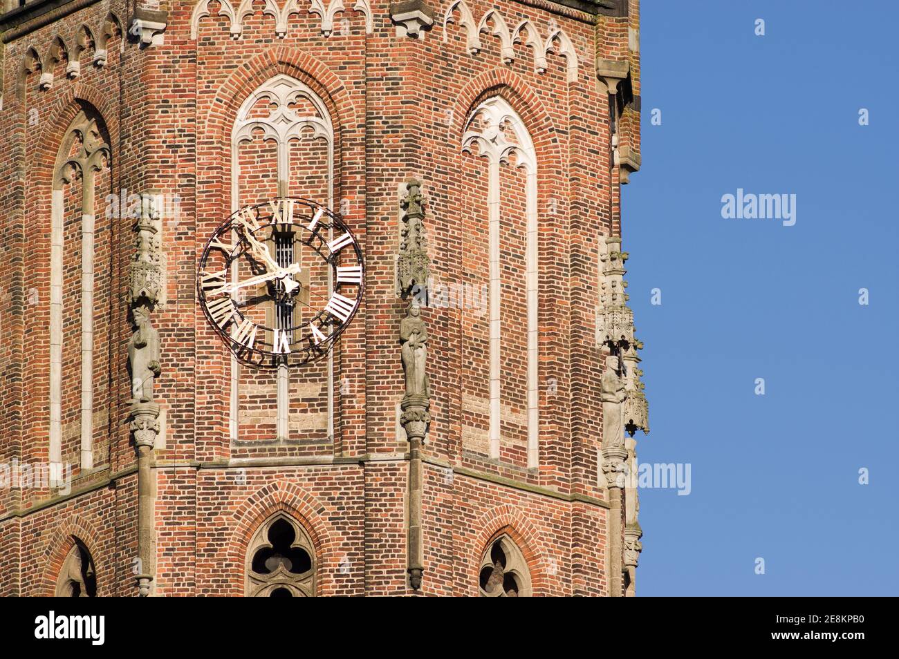 Closeup of the clock of the tower of the Sint-Maartenskerk in Elst in ...