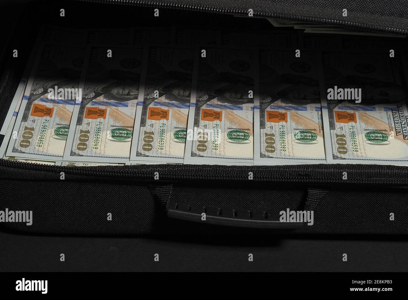 Money banknotes in suitcase hi-res stock photography and images - Alamy