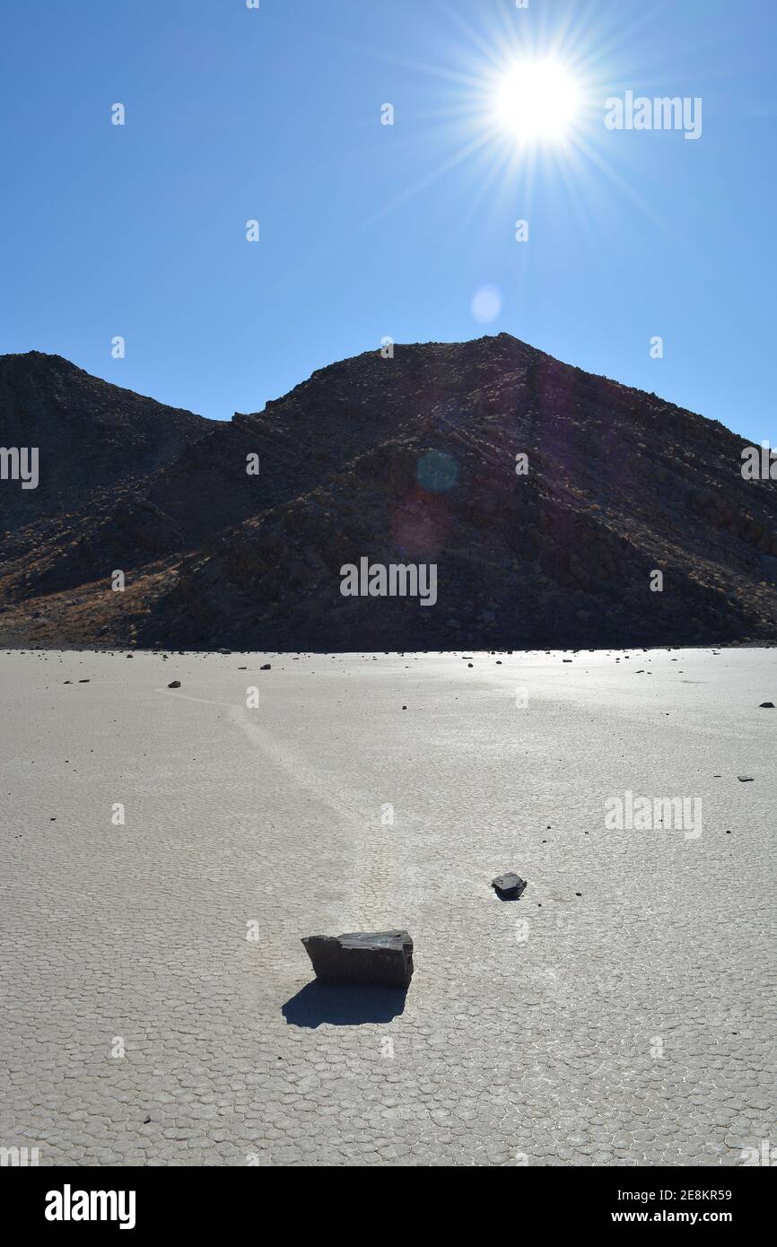 sailing rock leaving a long trail in the desert of the Racetrack Playa ...