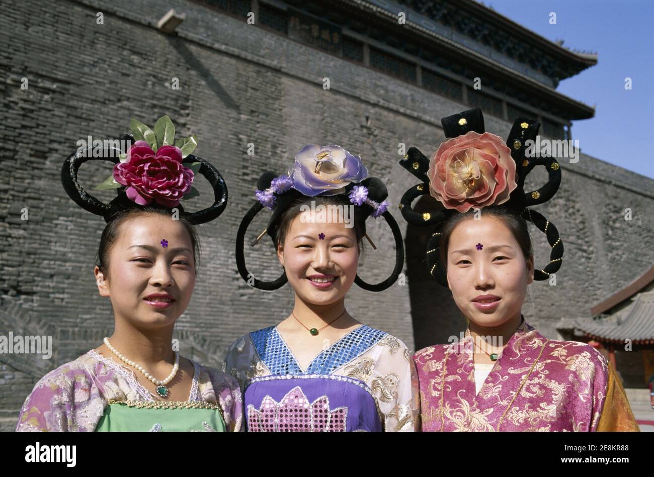 Asia, China, Shaanxi, Xian,portrait of smiling Chinese girls wearing ...