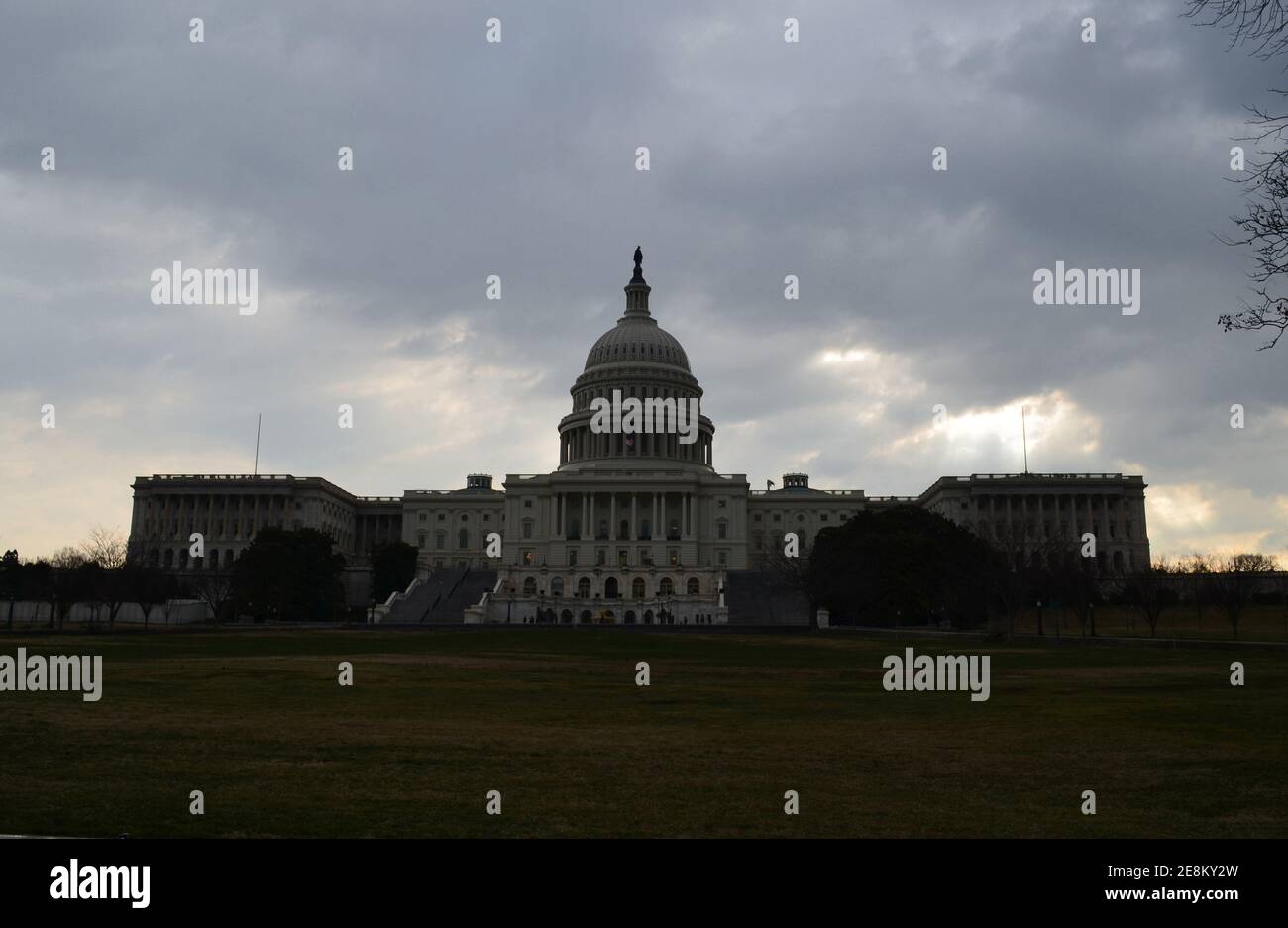 Sun rising behind the US Capitol in Washington DC Stock Photo - Alamy
