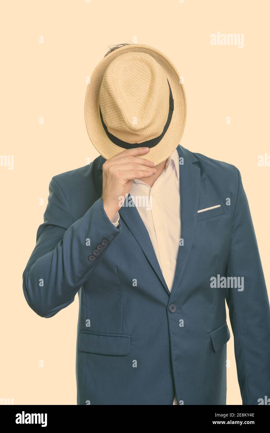 Man with hat covering face hi-res stock photography and images - Alamy