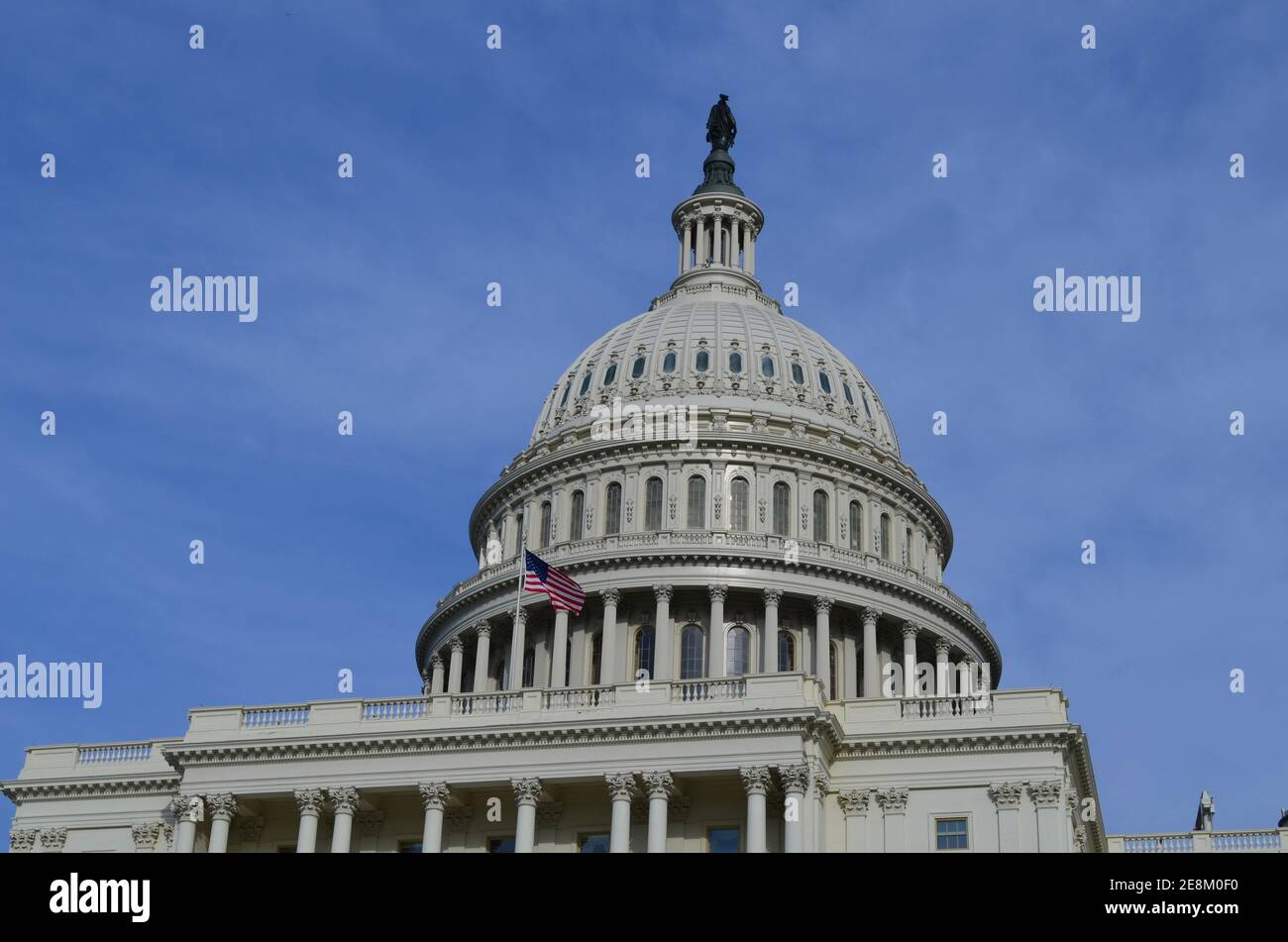 American flag flying on the US Capitol Building Stock Photo - Alamy