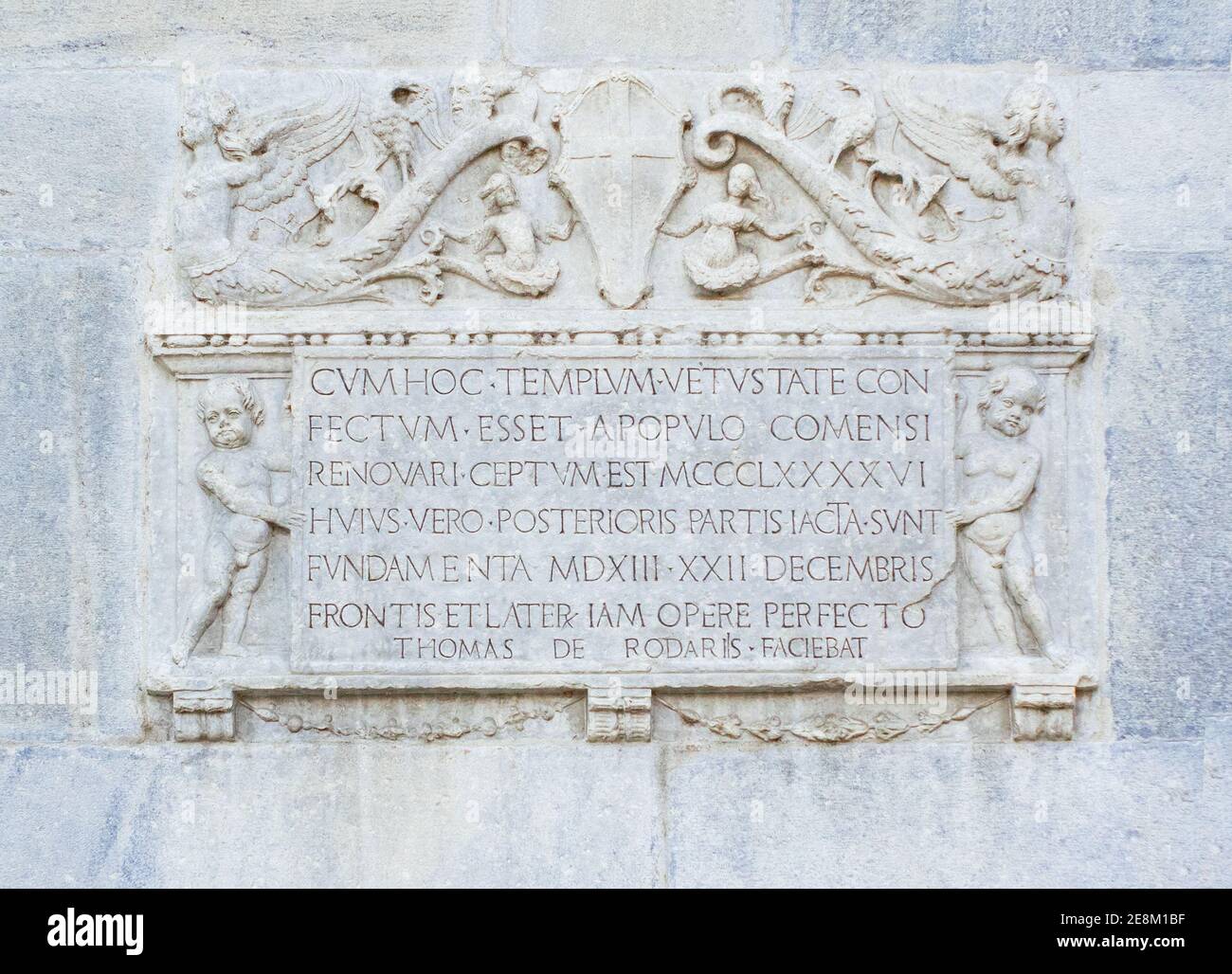 Latin inscription embellished with mythological figures carved in stone ...