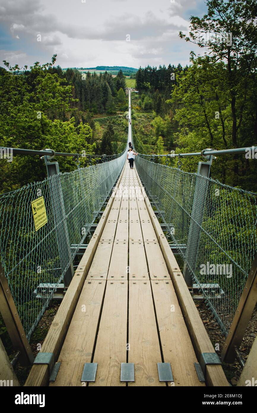 Geierlay Suspension Bridge in Hunsrück Mountain Range. It is the second ...
