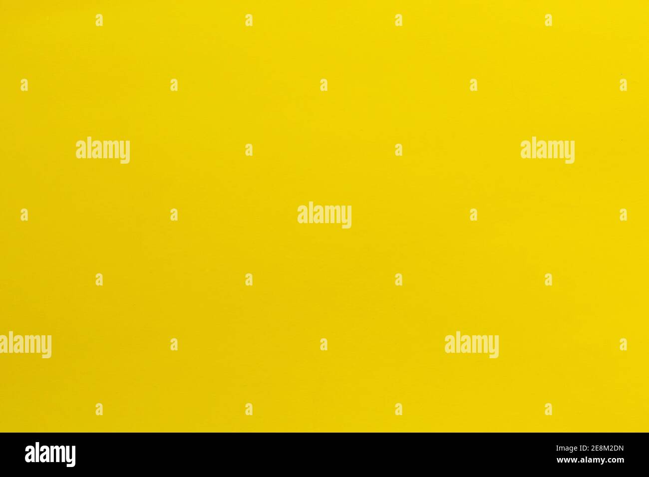 Close up Mottled yellow paper background and texture. Yellow paper with ...