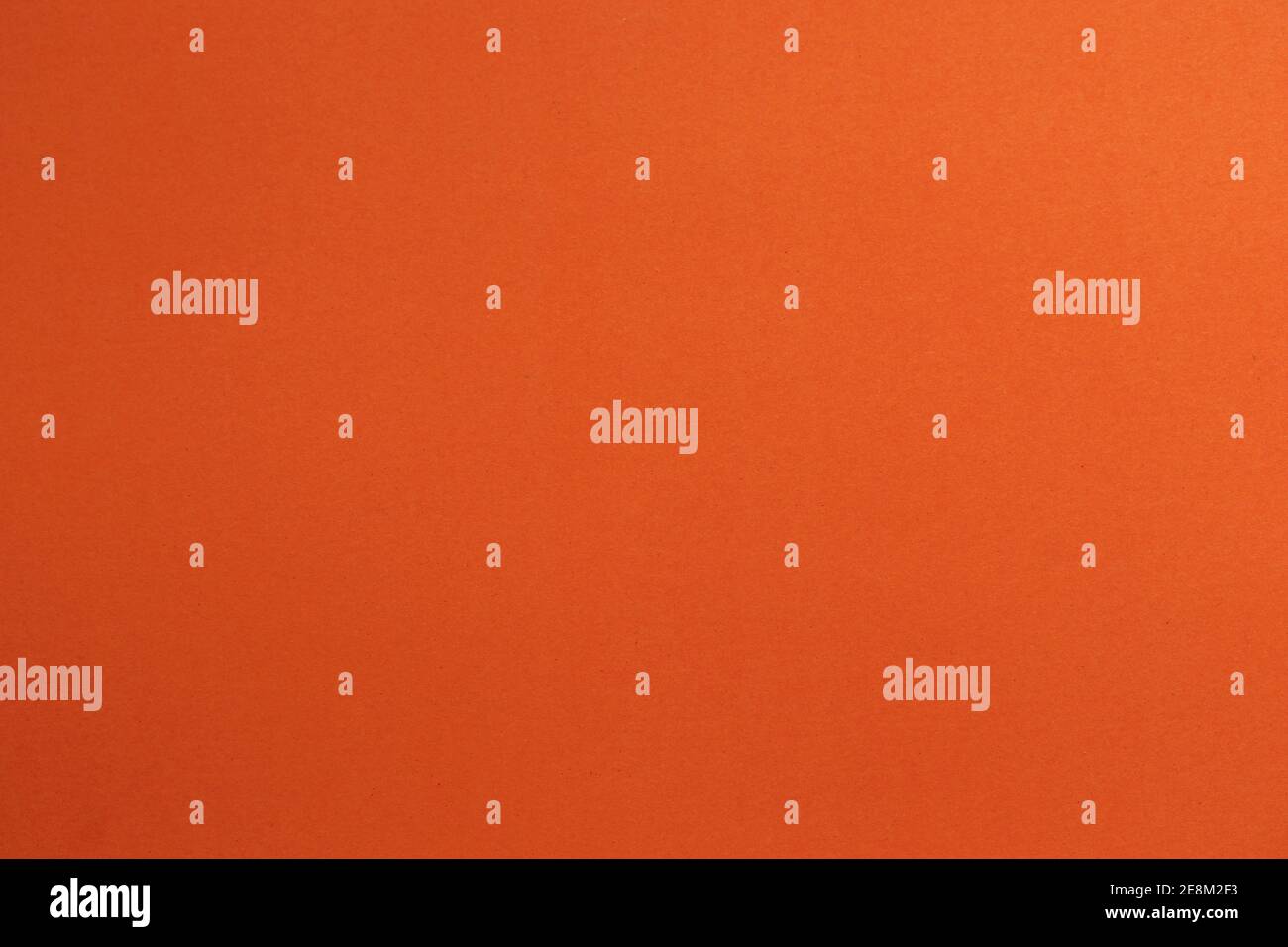 Close up Mottled orange paper background and texture. Orange paper with ...