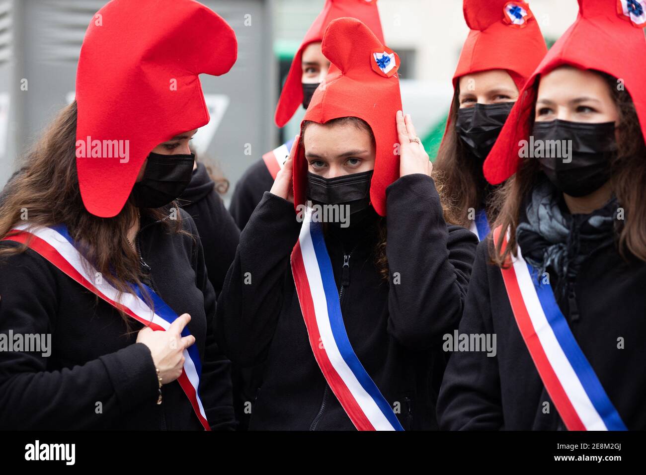 Paris, France. 31st Jan, 2021. Demonstrators wearing a Phrygian cap ...