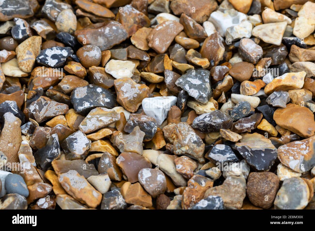 Close up of Romsey Shingle / Flint gravel a decorative aggregate for ...