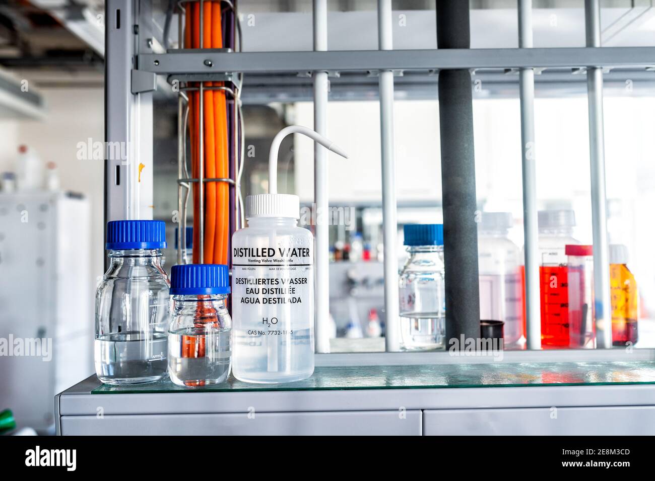 Closeup of laboratory glassware filled with transparent liquids Stock ...