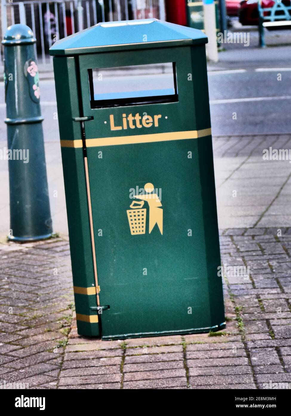 General Litter bin in village Stock Photo - Alamy