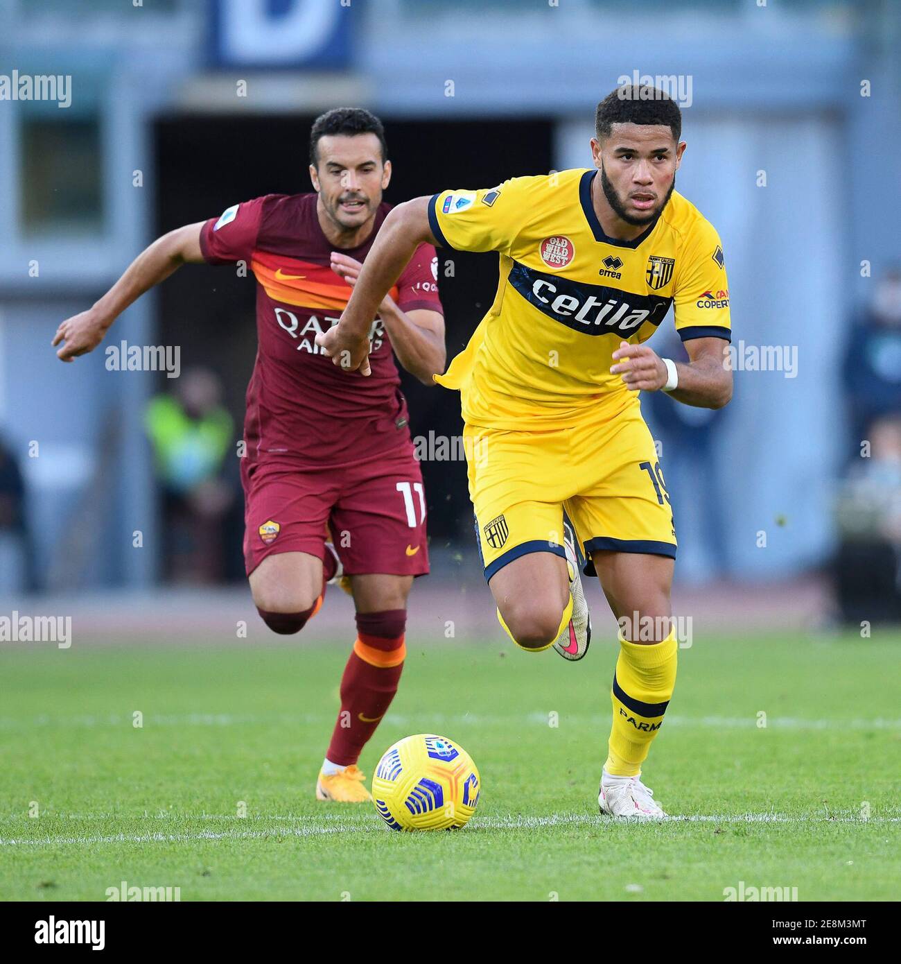 Simon Sohm of Parma Calcio (R) and Pedro of AS Roma looks on during the ...