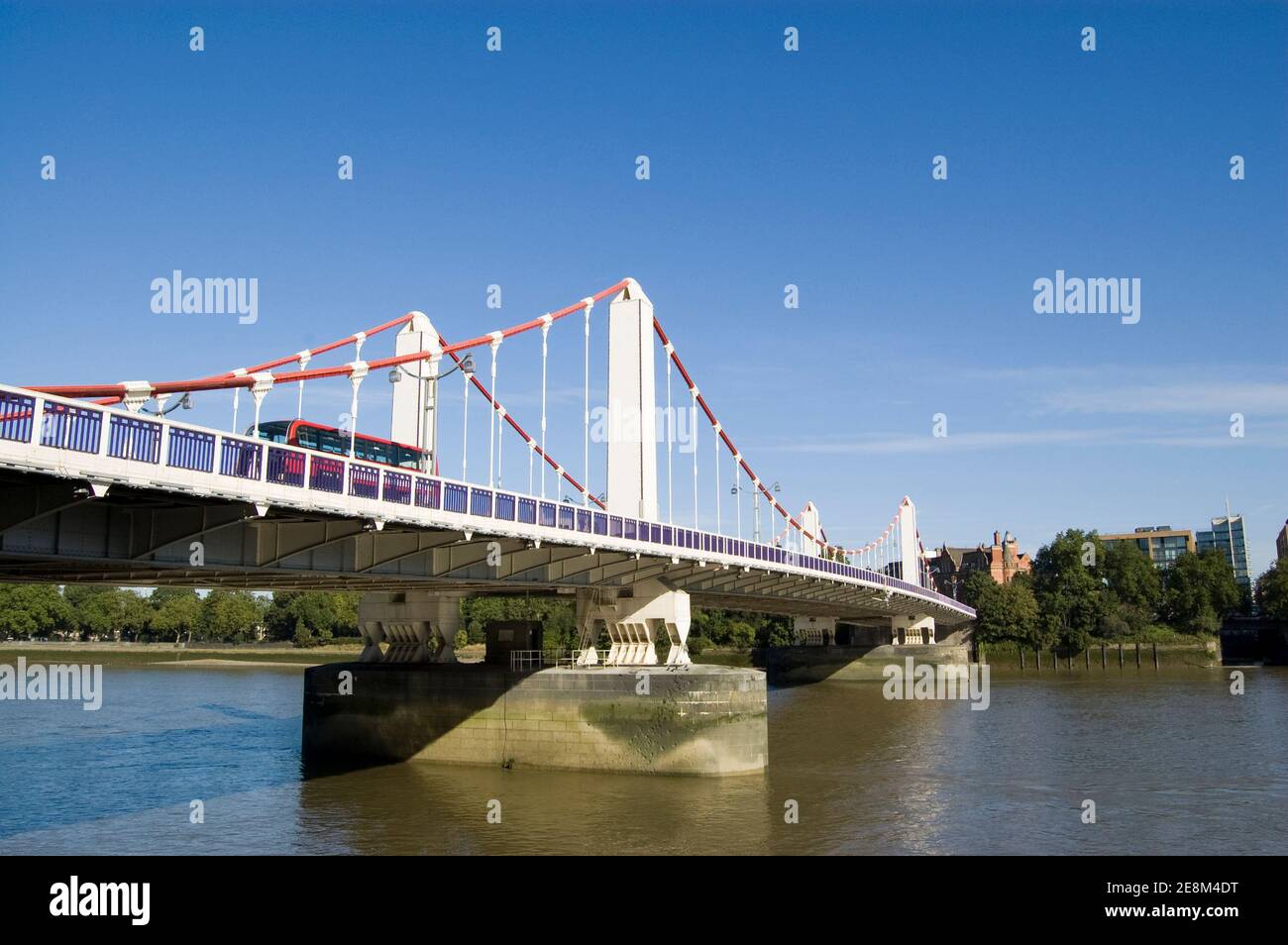 View from the southern bank of the River Thames of Chelsea Bridge ...