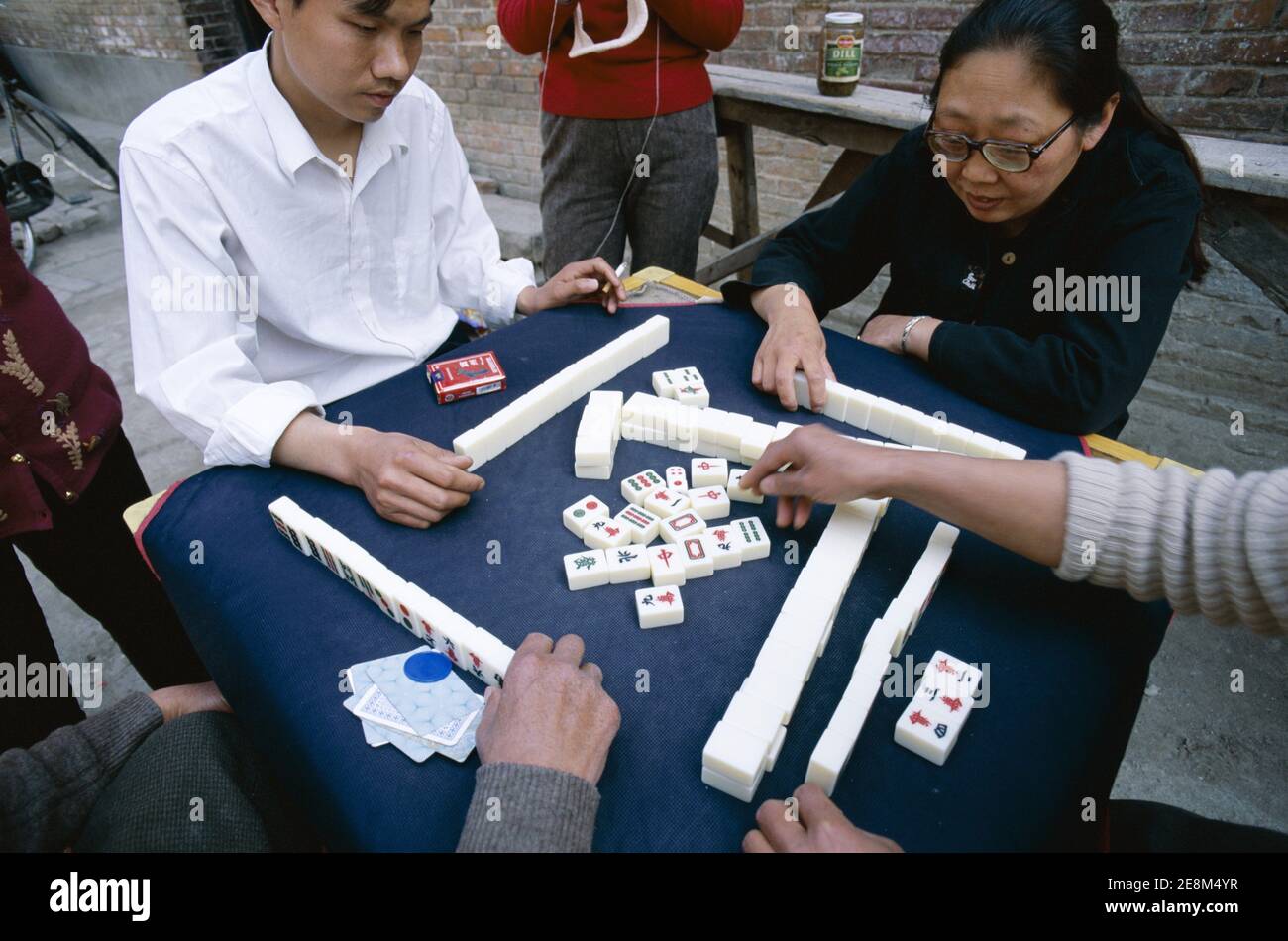 China, Beiging,people playing the traditional Chinese game of Majong ...