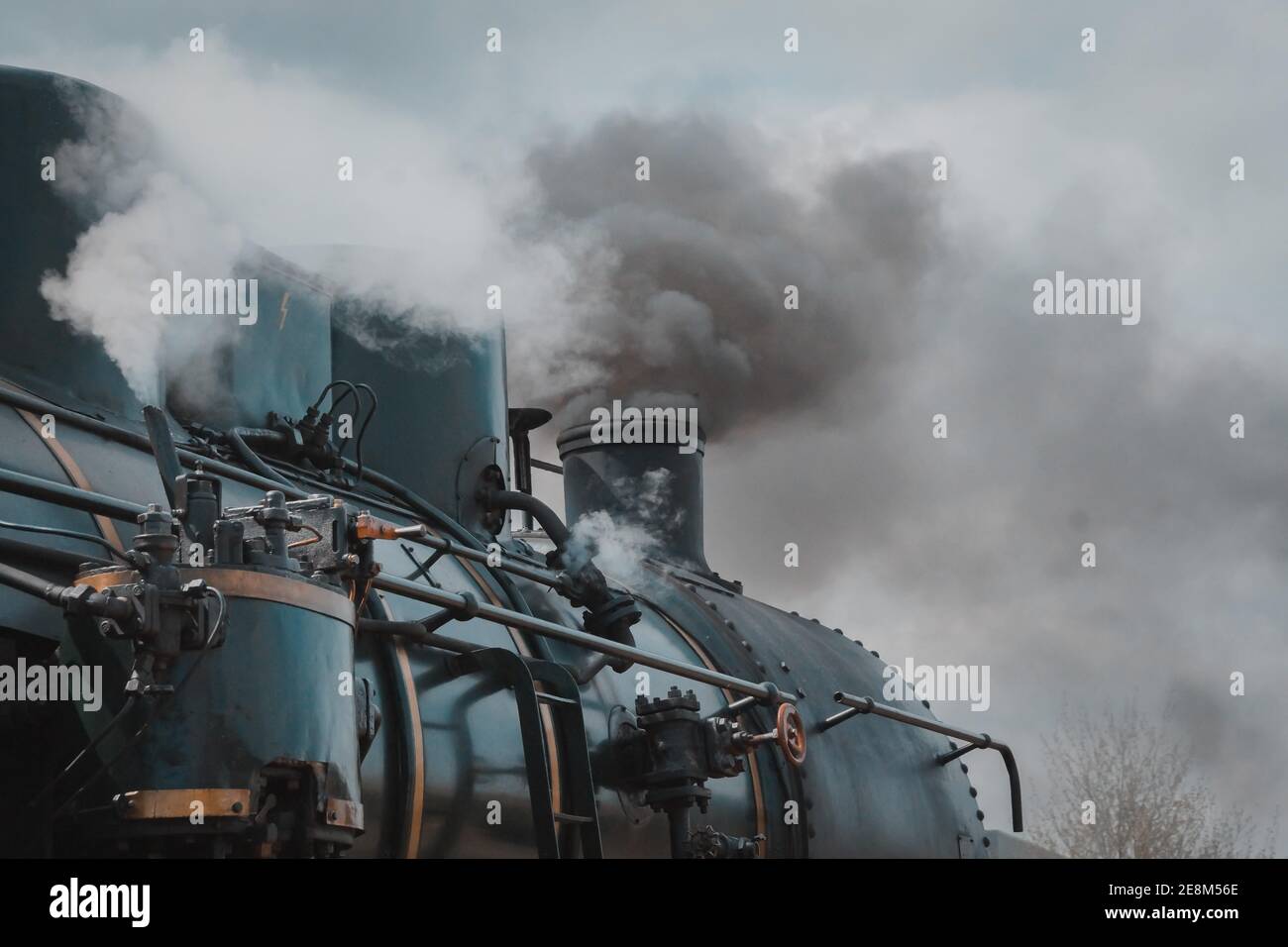 A low angle shot of a smokebox of a locomotive while driving captured ...