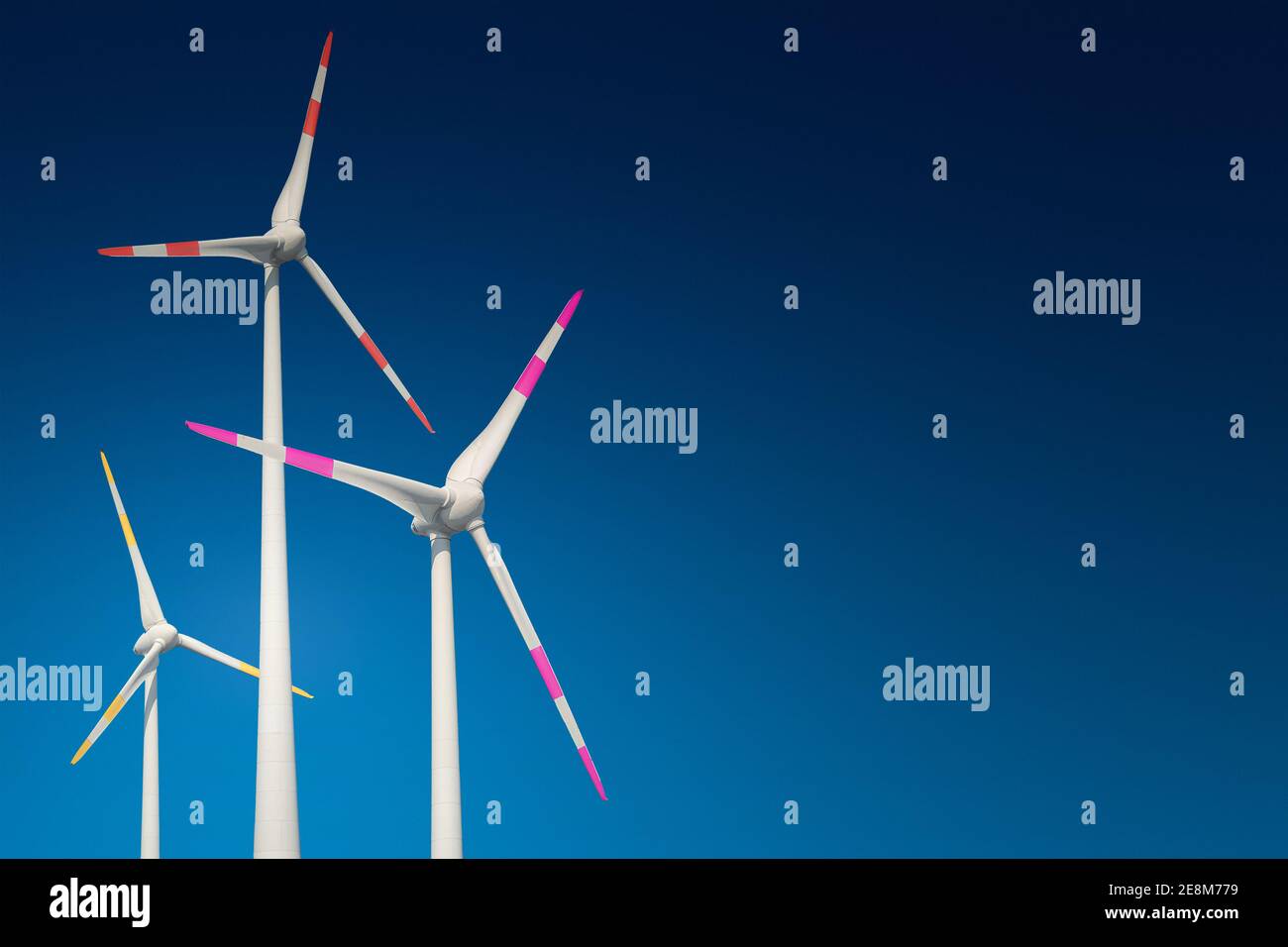 Group of big wind turbines to generate electrical power as green ...