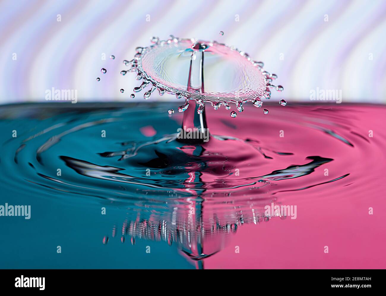 High resolution macro photograph of a colorful water drop splashing ...