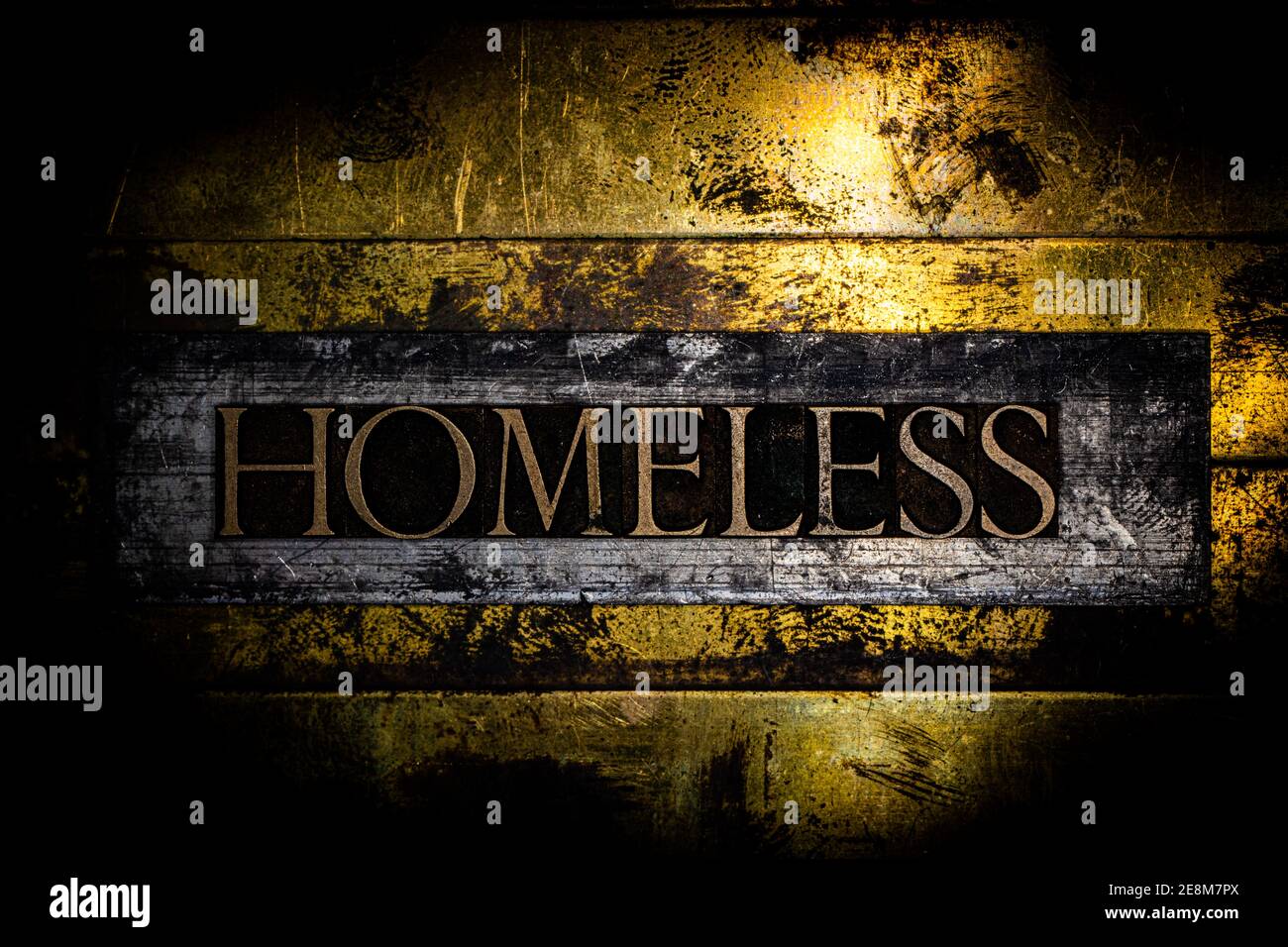 Homeless text on grunge textured authentic copper and gold background ...