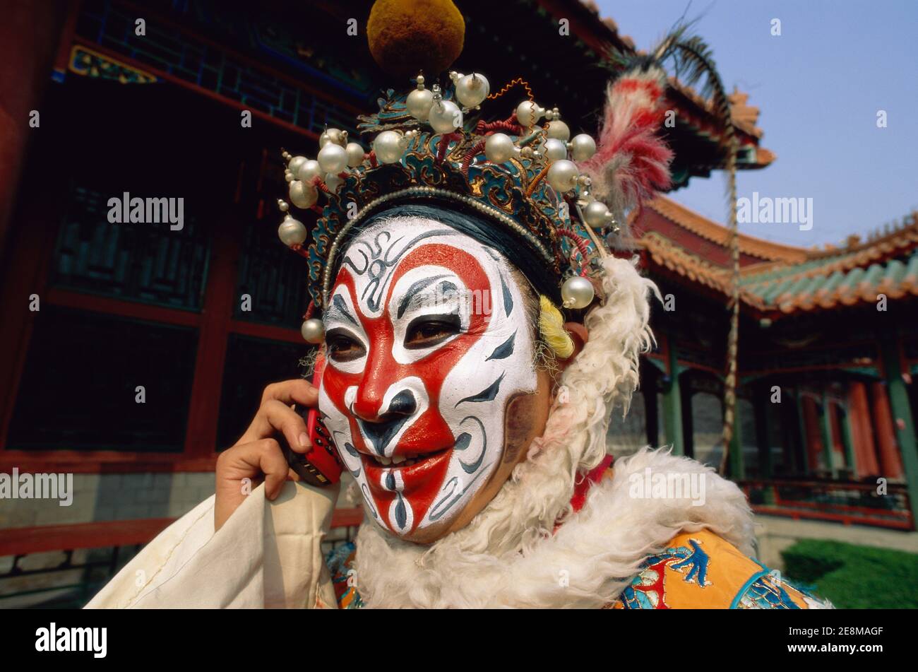 China, Beijing, Chinese Opera (Peking Opera), Actor Talking on Mobile ...